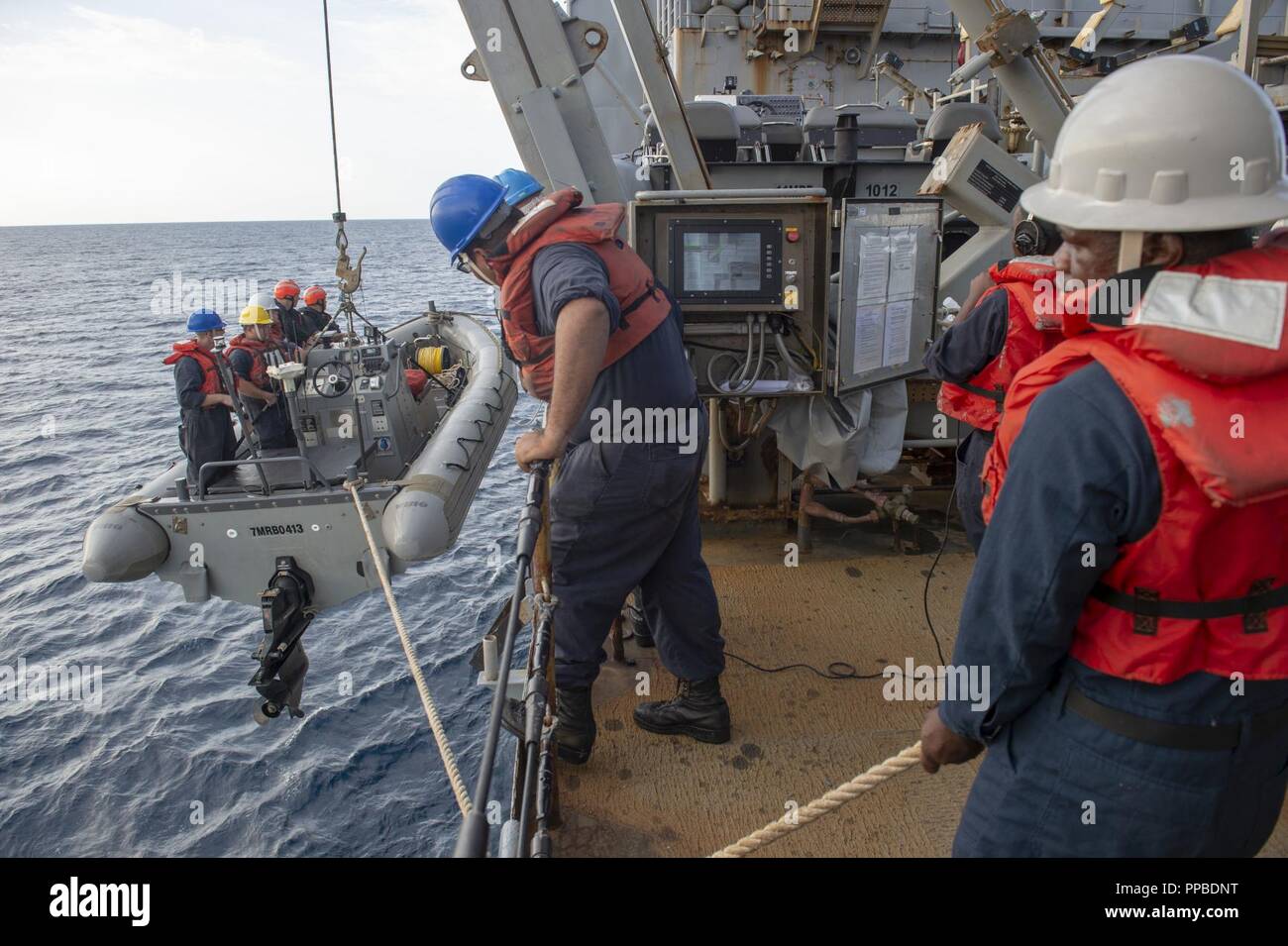 ATLANTIC OCEAN (Aug. 22, 2018) – Sailors prepare to lower a 7-meter ...