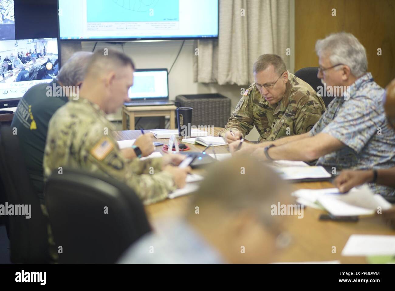 Hawaii Adjutant General Arthur “Joe” Logan, prepares for the morning ...