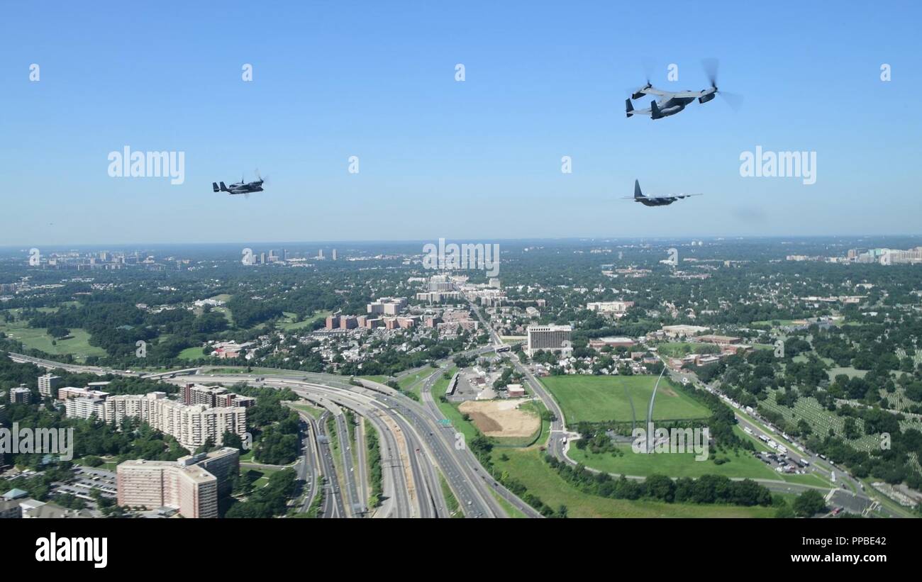 An AC-130U Spooky gunship, MC-130H Combat Talon II and two CV-22 Osprey ...
