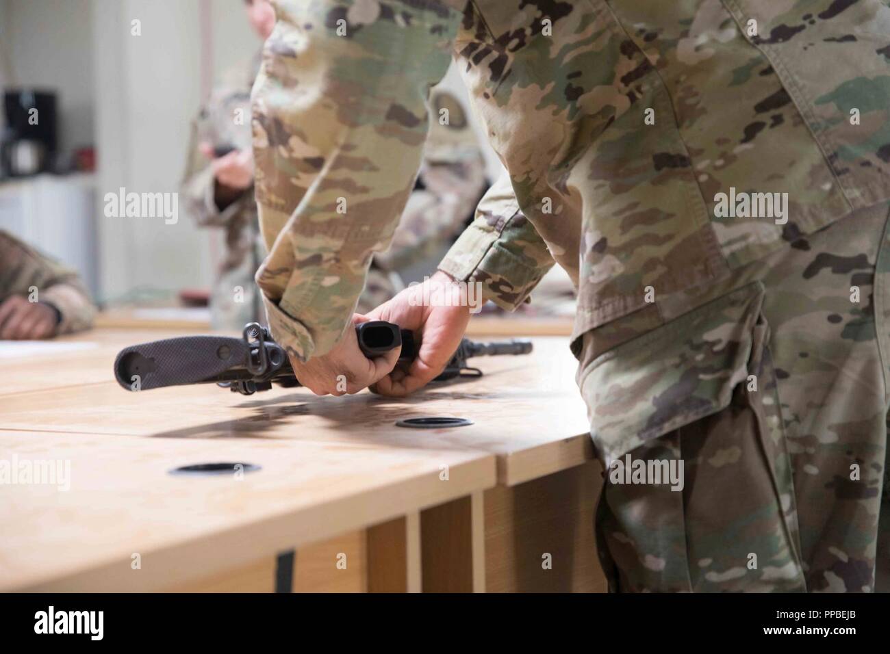 Hands on weapons test hi-res stock photography and images - Alamy