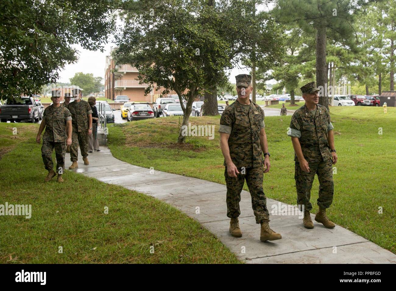 U.S. Marine Brig. Gen. Karsten Heckl and Col. Paul Baker, cut the ...