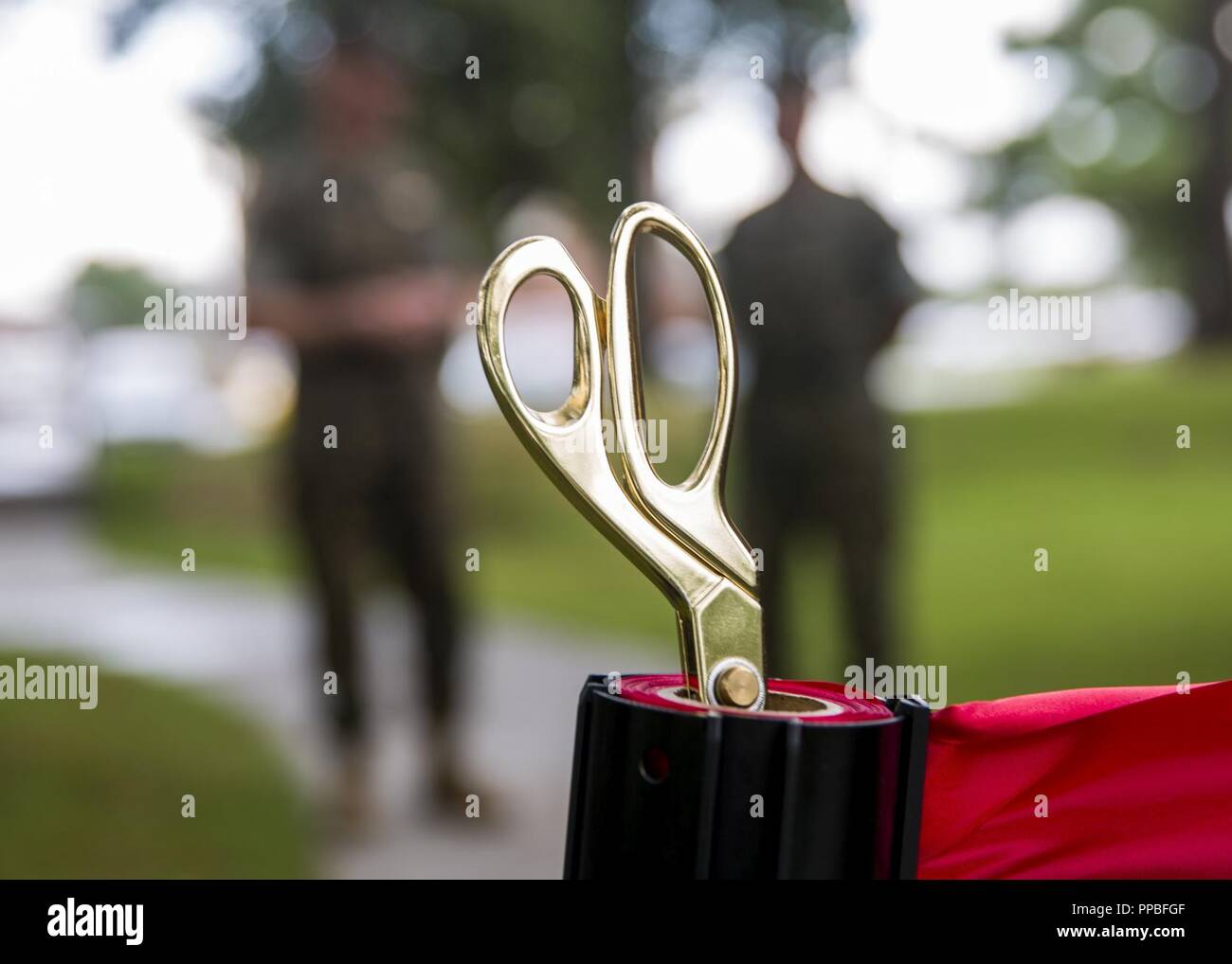 U.S. Marine Brig. Gen. Karsten Heckl and Col. Paul Baker, cut the ...