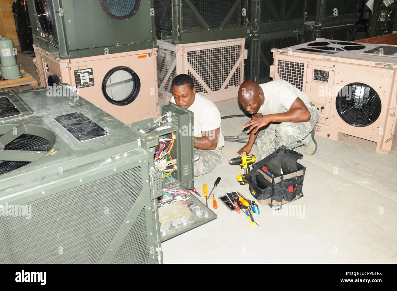 Tech. Sgt. Akil McFarlande, a heating, ventilation, air condition ...