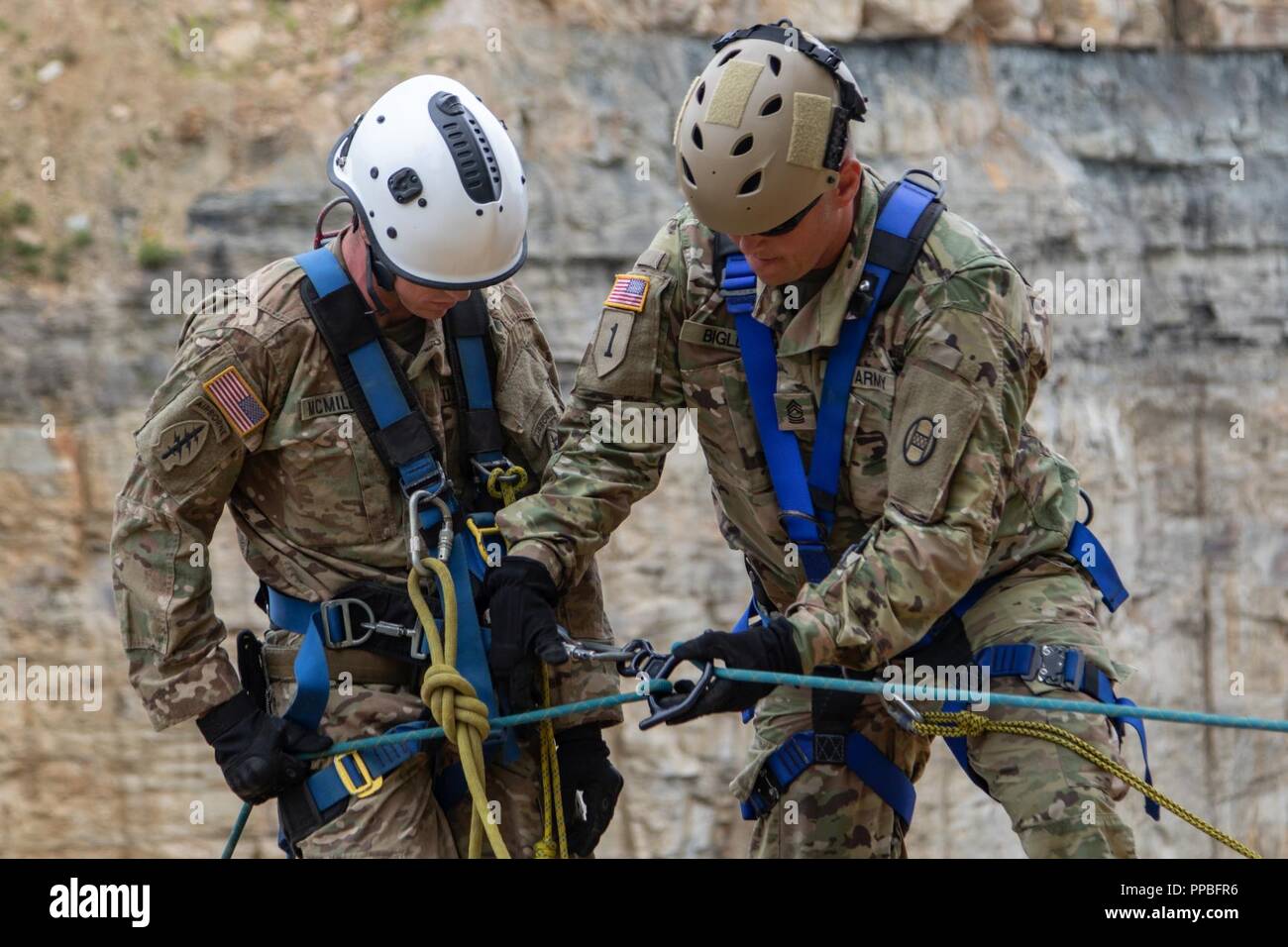 West Virginia Army National Guard Sgt. Corey McMillan is safety checked ...