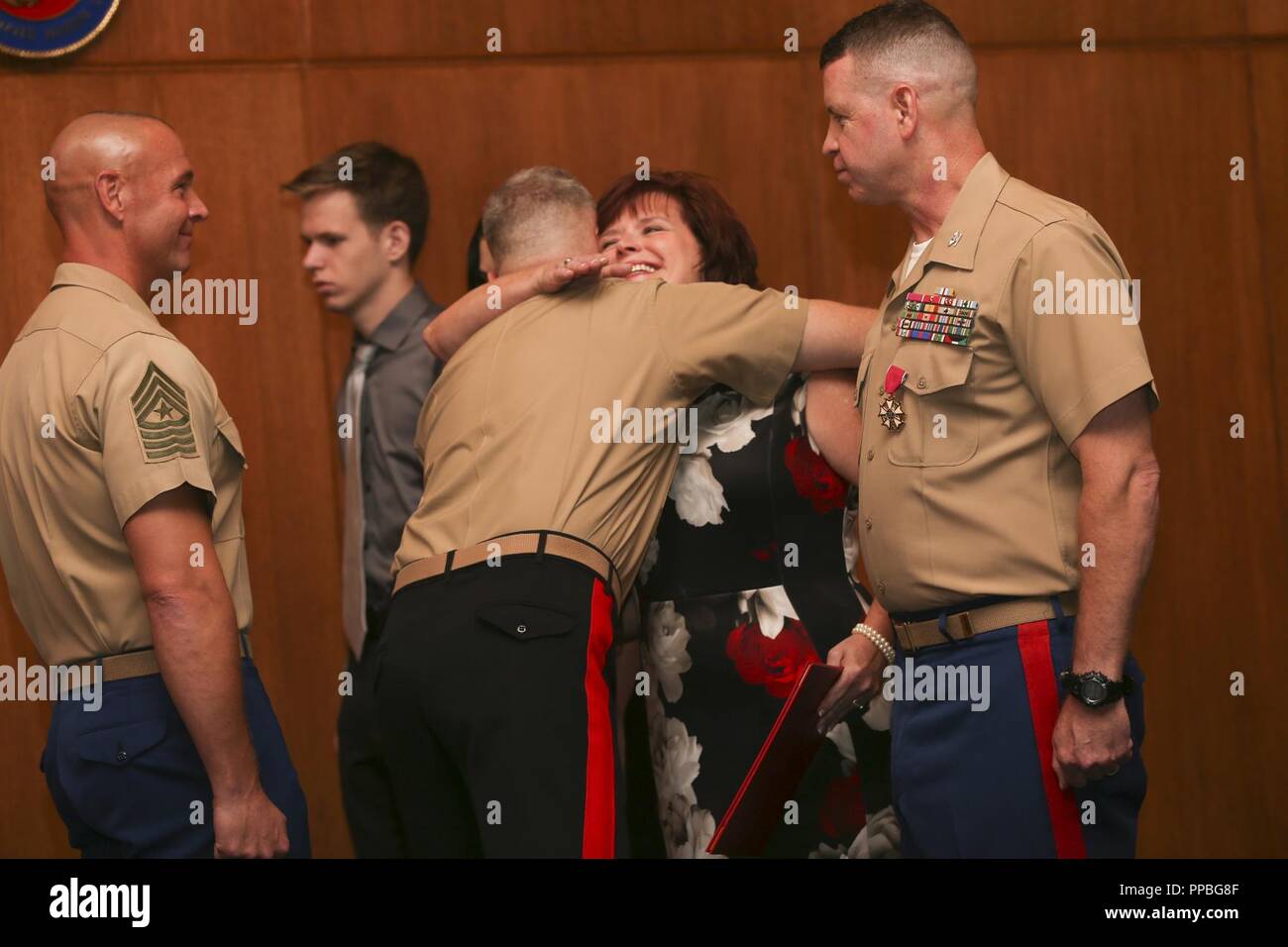 The wife of U.S. Marine Corps Col. Wayne A. Sinclair, director, School ...