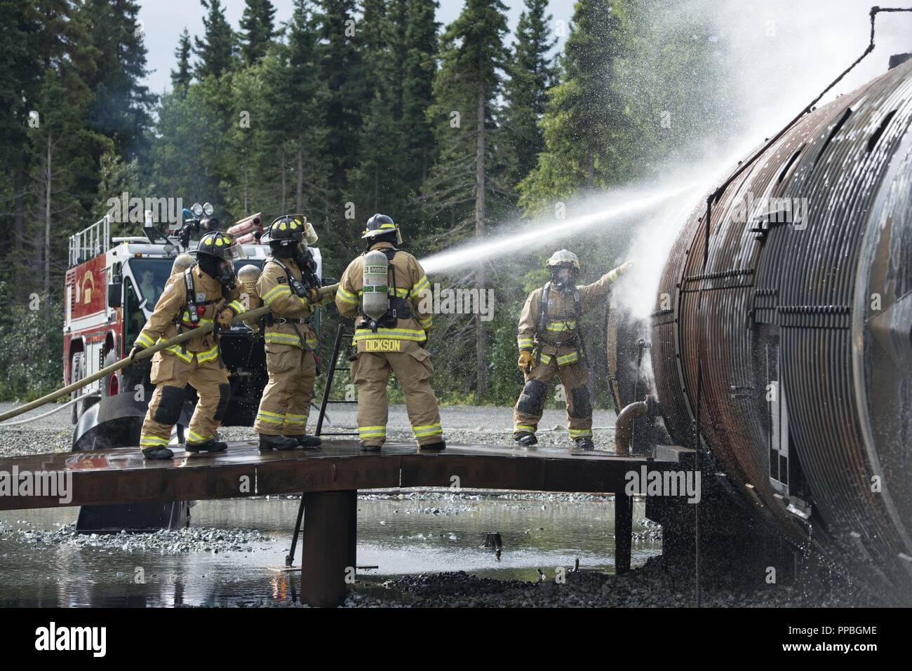 U.S. Air Force fire protection specialists assigned to the 673d Civil ...