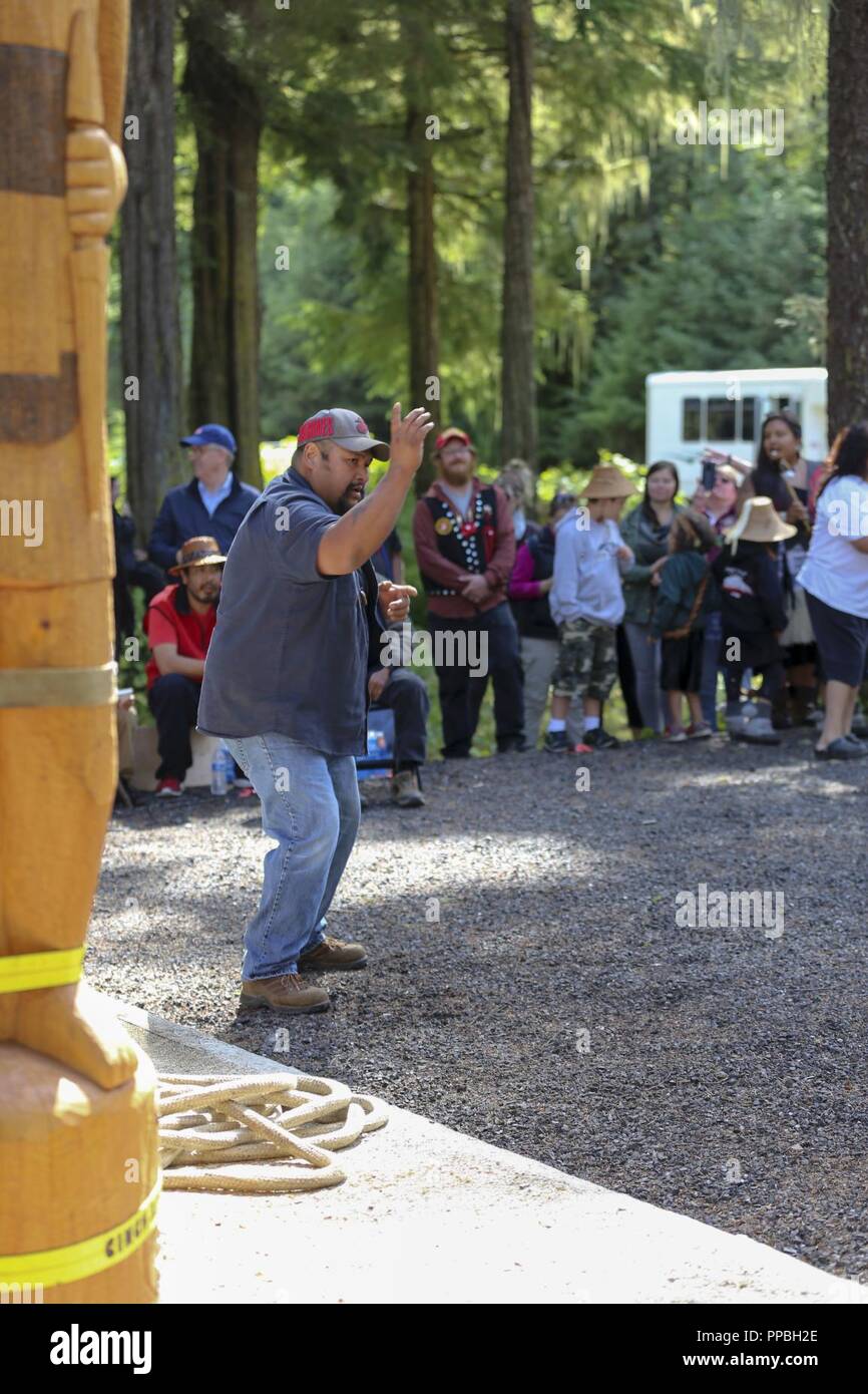 The Veterans Totem Pole carver, Jon Rowan, a U.S. Marine Corps veteran ...