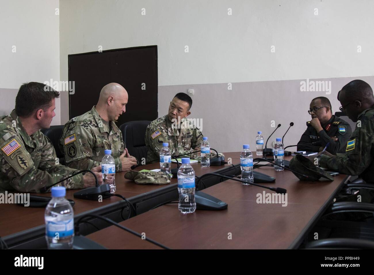 U.S. Army Col. Doug Phillips, center, team officer in charge, 28th ...