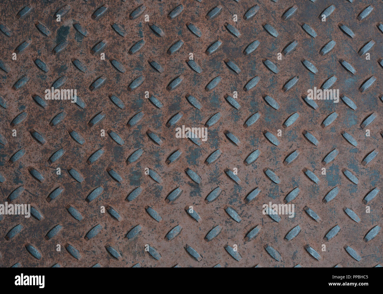 Weathered and rusty diamond metal plate Stock Photo - Alamy