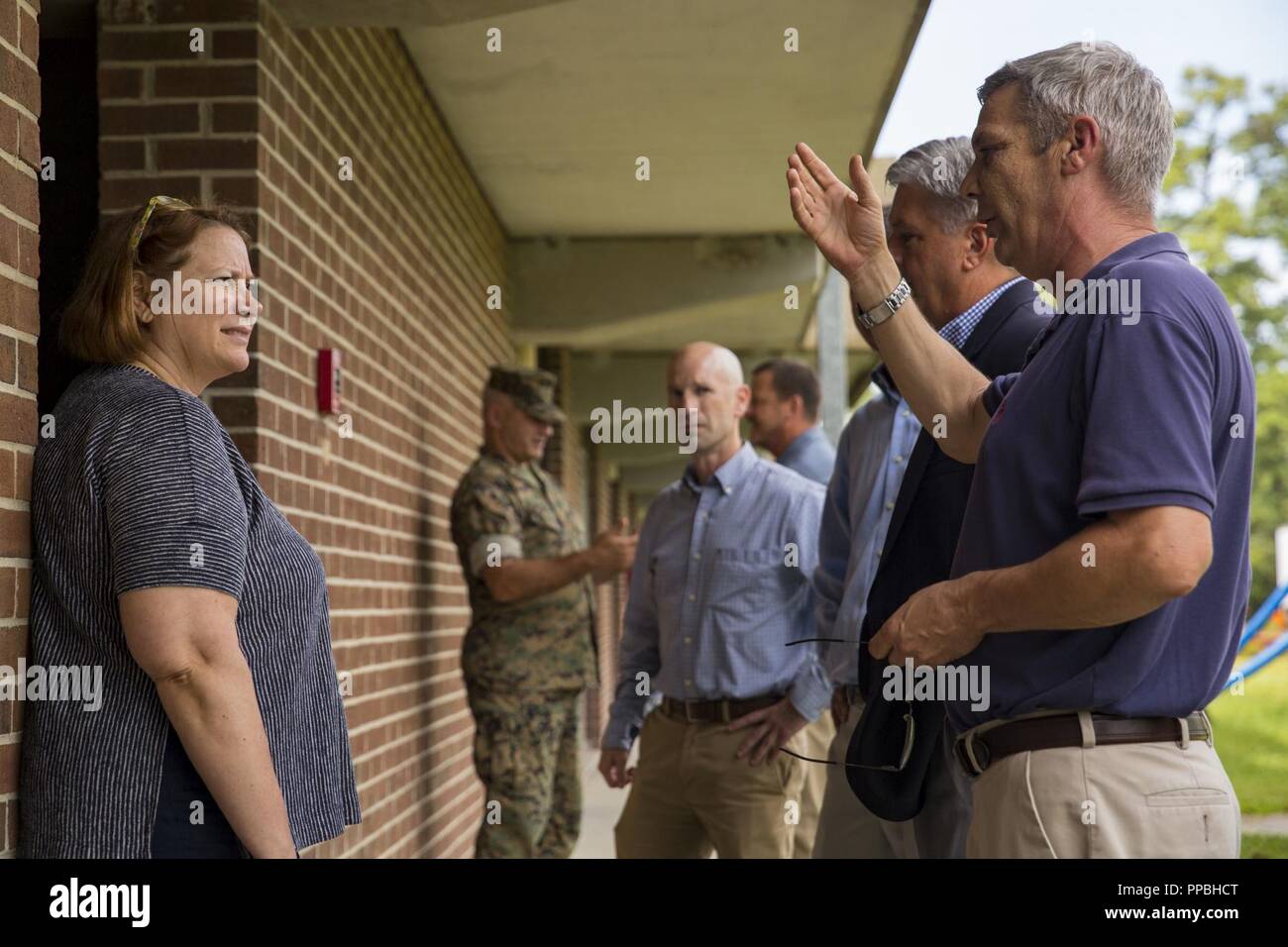 The Honorable Caral E. Spangler, left, assistant deputy commandant for ...