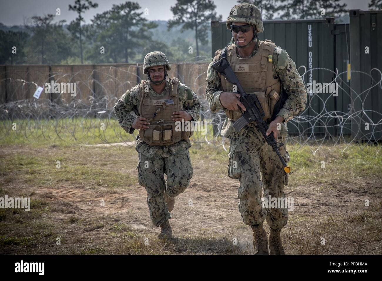 A seabee assigned to naval mobile construction battalion nmcb 23 hi-res ...