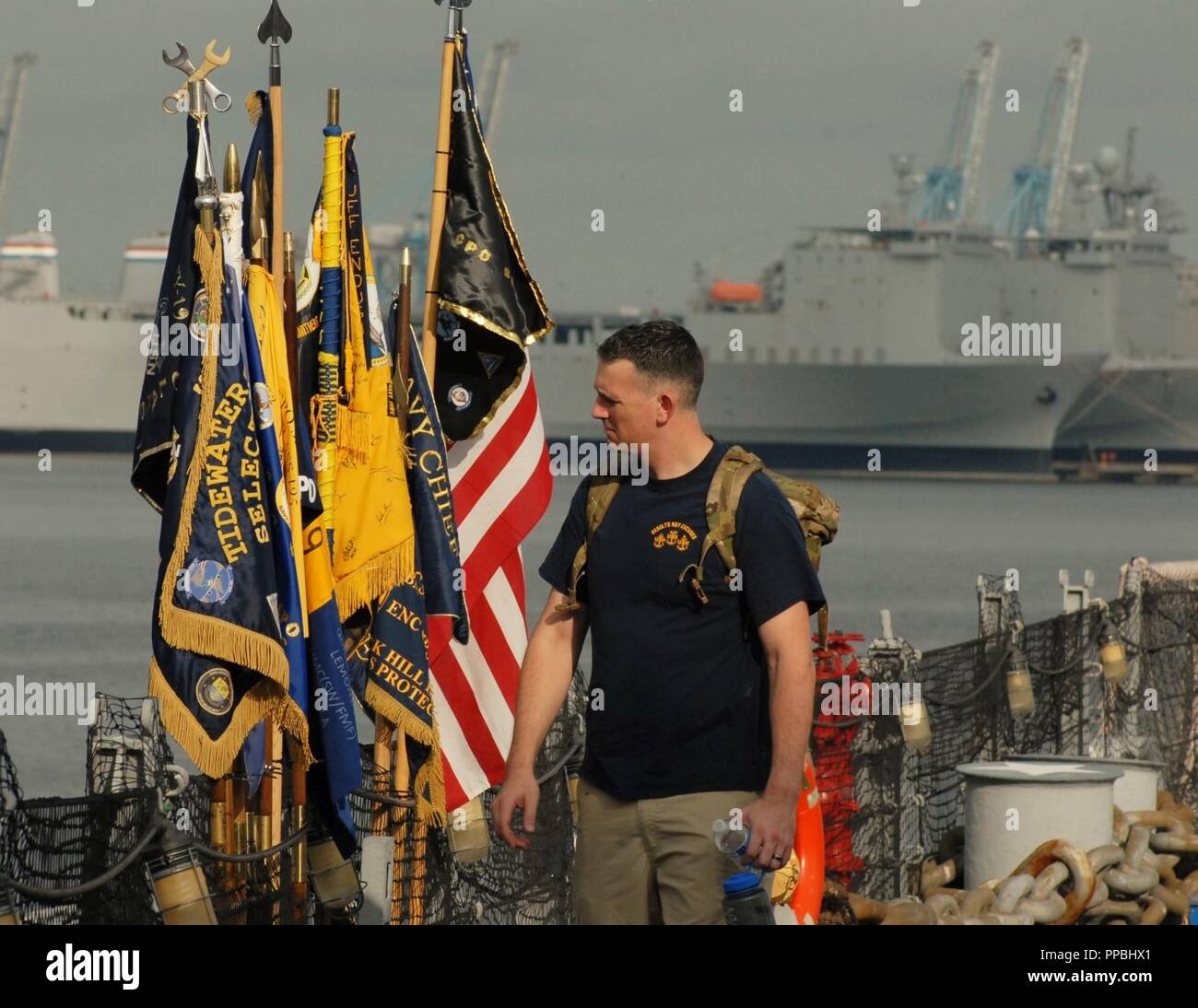 Guidons displayed aboard the USS Wisconsin (BB-64) are reviewed during ...