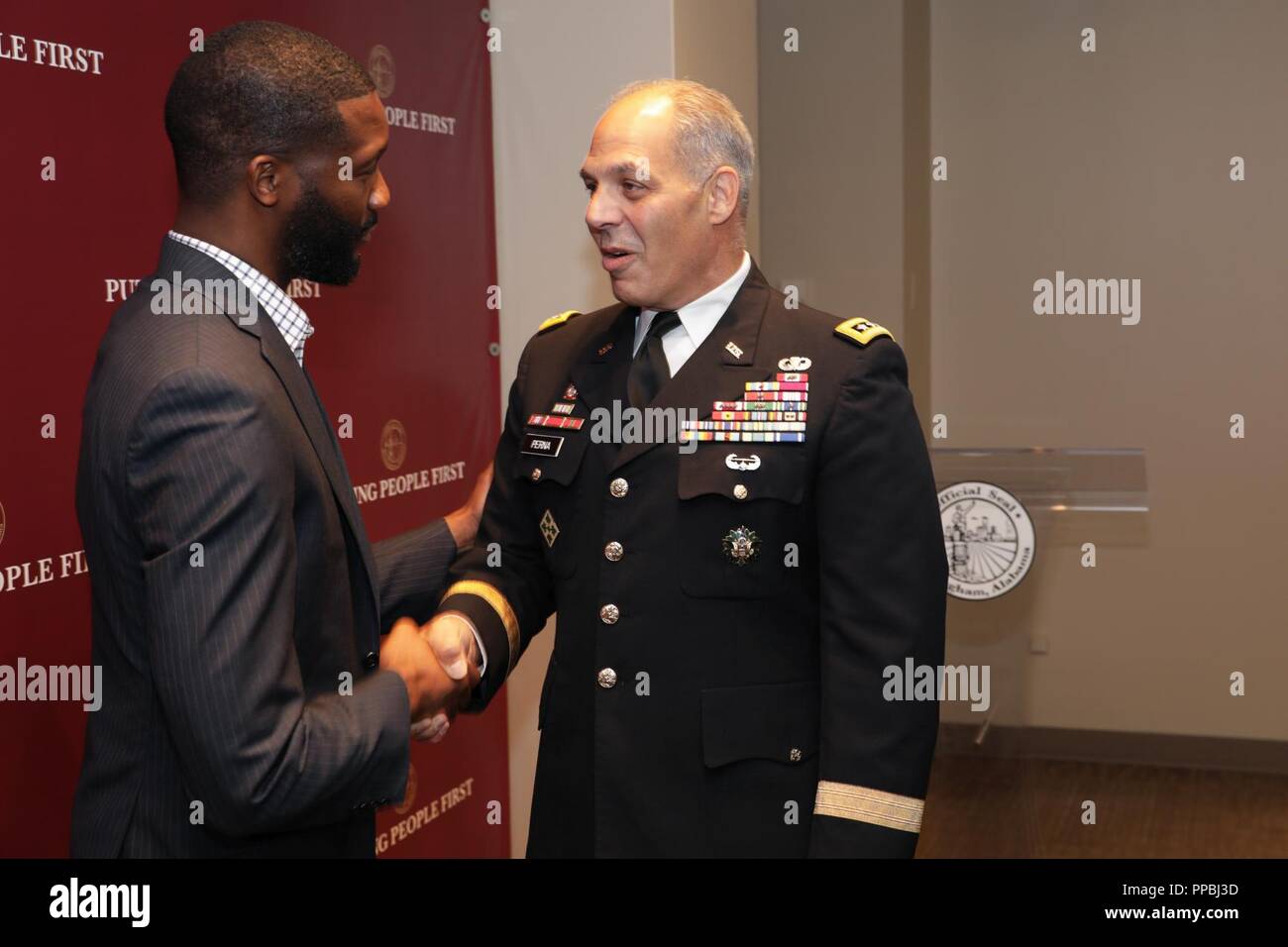 Birmingham, Ala., Mayor Randall Woodfin and Gen. Gus Perna, commander ...