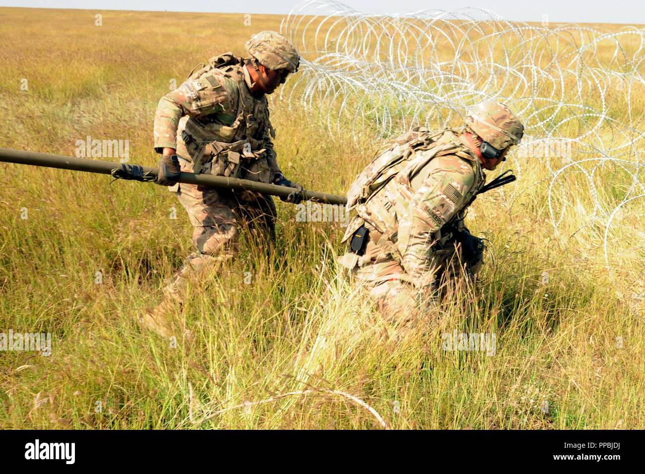 Combat engineers U.S. Army Pfc. Jesus Rodriguez, left, and Sgt. Garrett ...