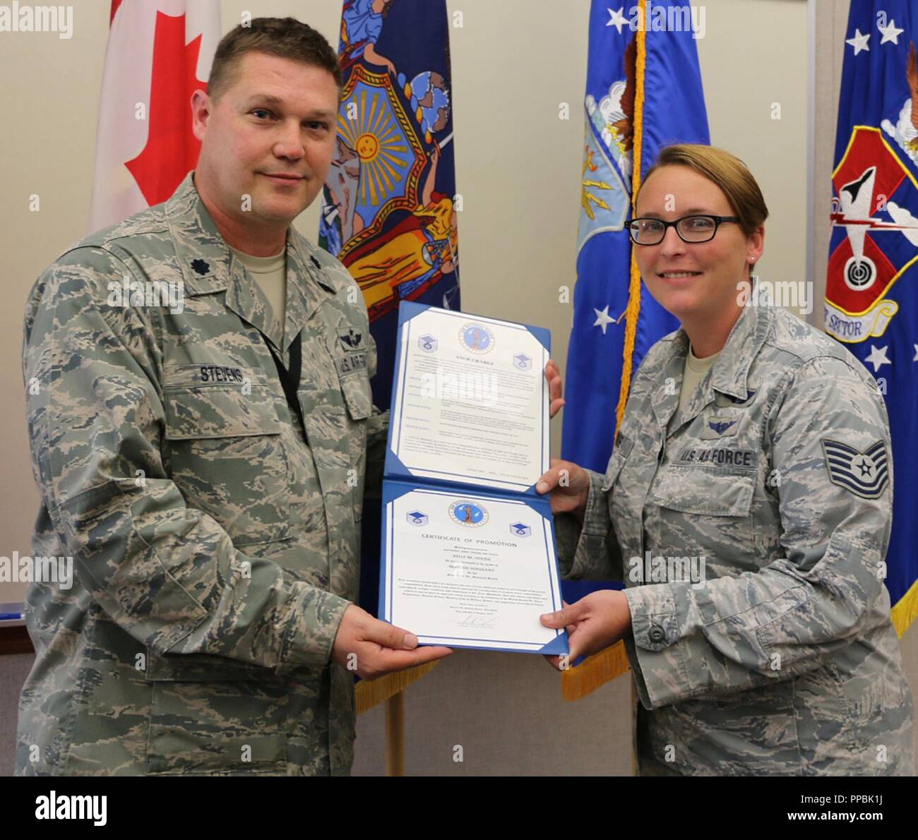 Master Sgt. Kelley House, right, received her rank during a promotion ...