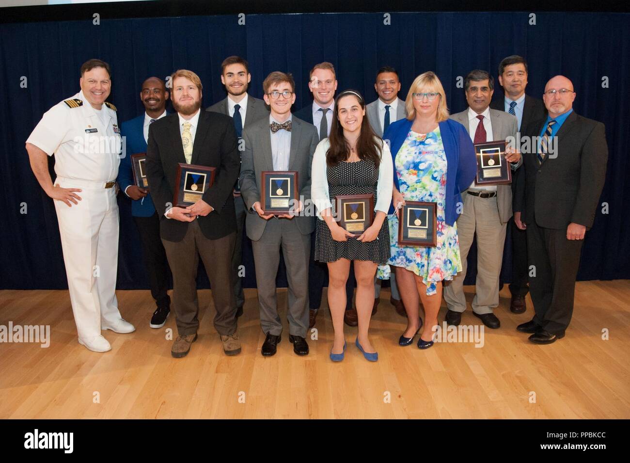 The MK 18 Mod 2 Lithium Battery Test Team receives the Rear Adm ...