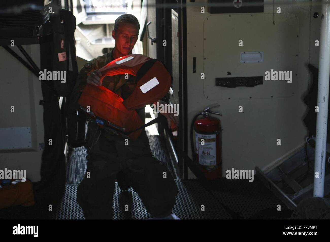 A Swedish coastal ranger with 1st Marine Regiment teaches Marines with ...