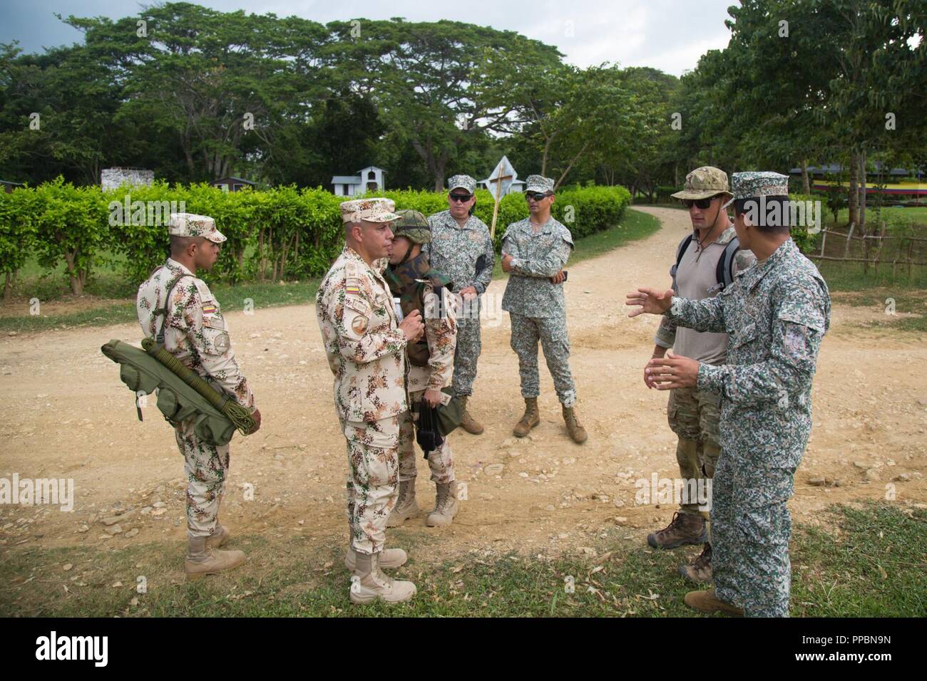 U.S. Navy Explosive Ordnance Disposal Technicians, assigned to ...