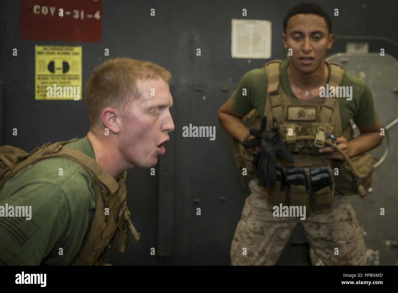 INDIAN OCEAN - U.S. Marines Cpl. Anthony Varrone and Lance Cpl. Roy ...