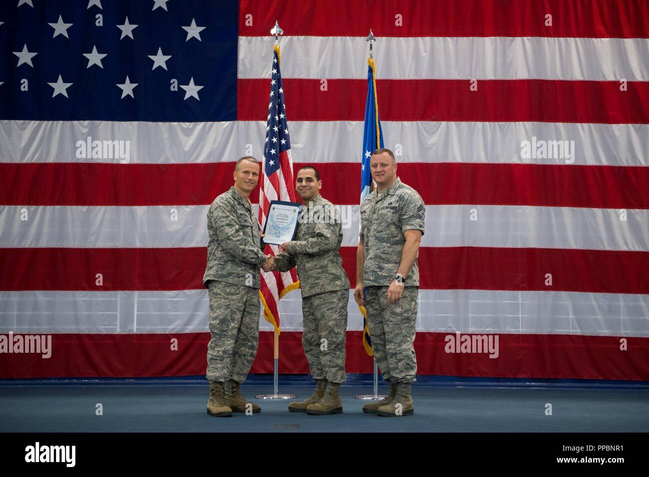 Barksdale personnel are recognized for their promotions during a ...