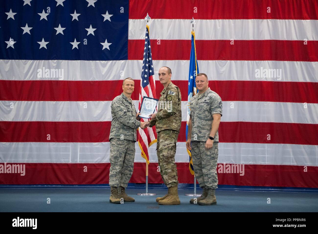 Barksdale personnel are recognized for their promotions during a ...