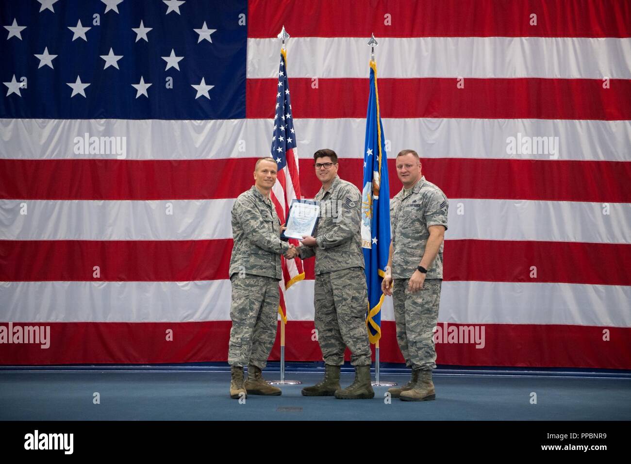 Barksdale personnel are recognized for their promotions during a ...
