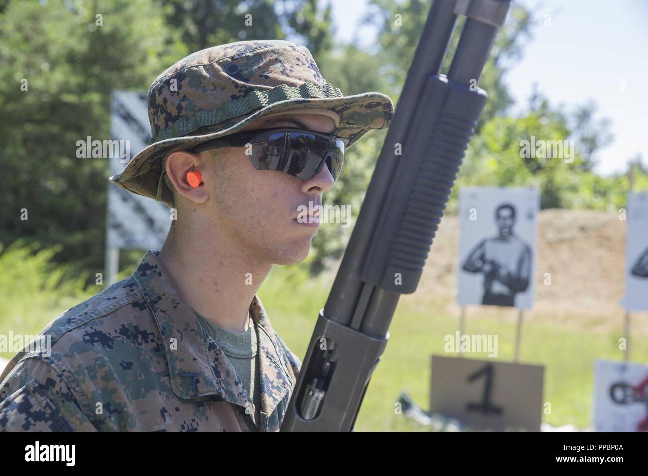 A Marine with Marine Corps Embassy Security Group (MCESG) practices ...