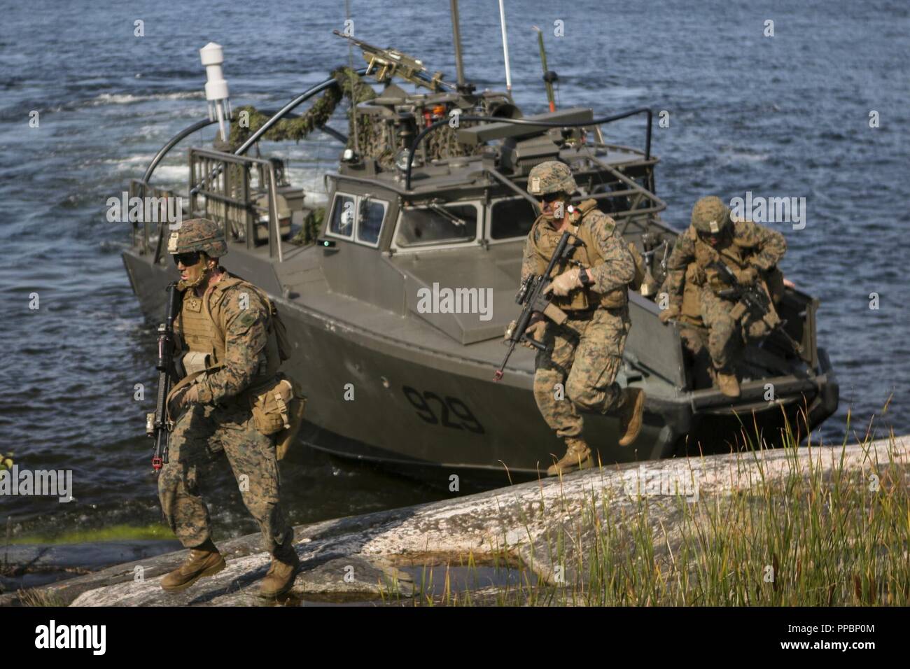 U.S. Marines with Marine Rotational Force-Europe 18.1 conduct an ...