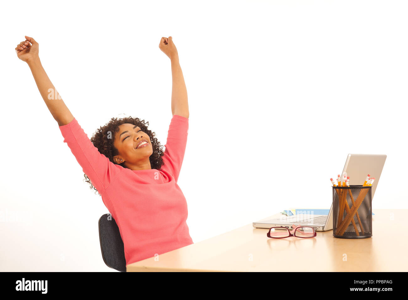 Happy millennial black businnesswoman finished with work on notebook ...