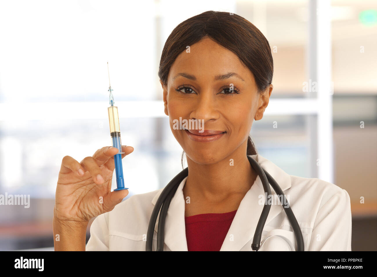 African nurse injection closeup hi-res stock photography and images - Alamy