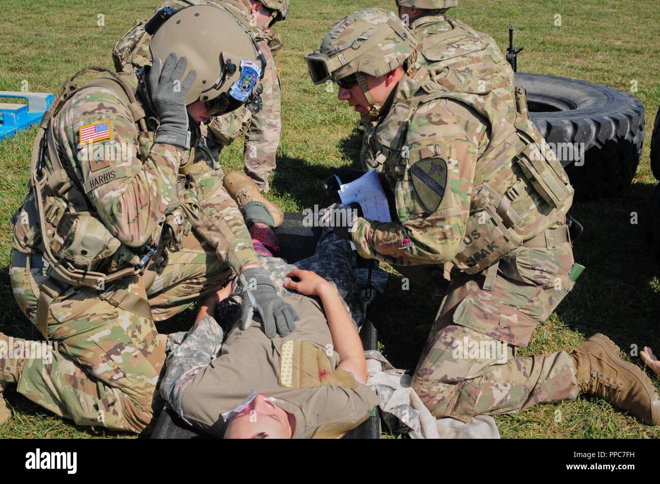 U.S. Army Spc. Brandon Espindola (right) a combat medic assigned to The ...