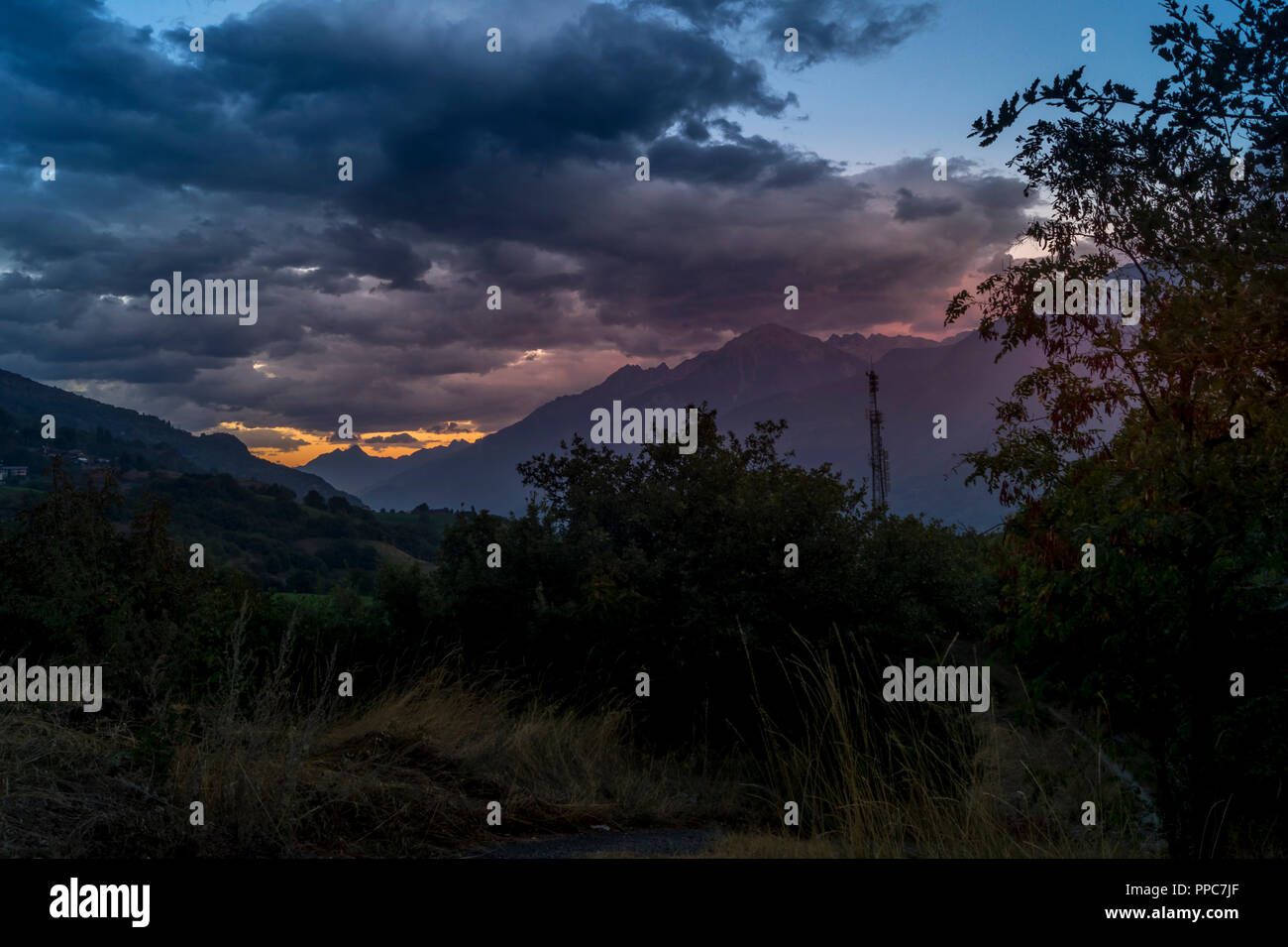 Sunset on italian Alps Mountain. Colorfull sky Stock Photo - Alamy