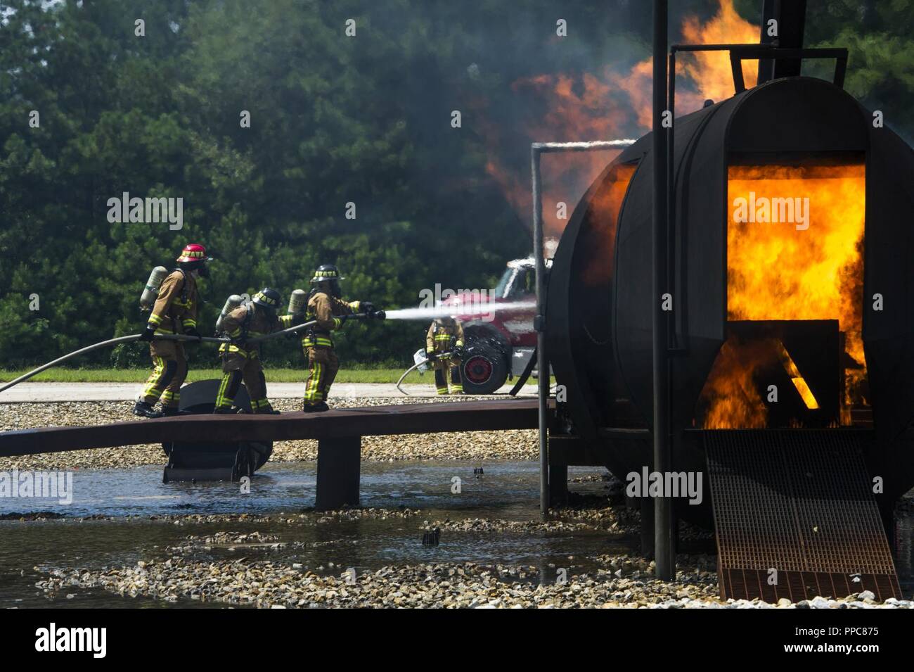 U.S. Air Force Reserve firefighters with the 624th Civil Engineer ...