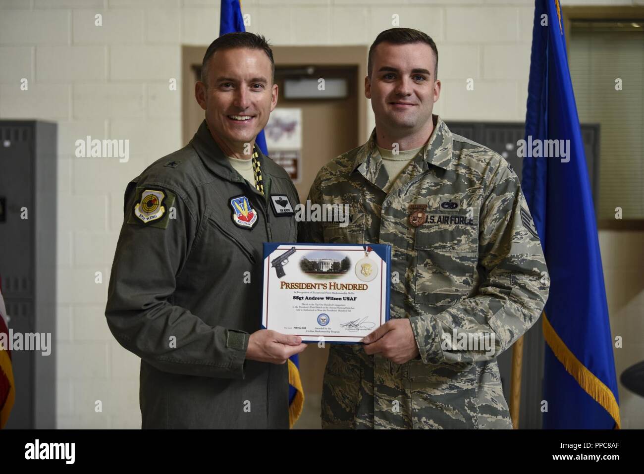 Brig. Gen. Robert G. Novotny, 57th Wing commander, presents the ...