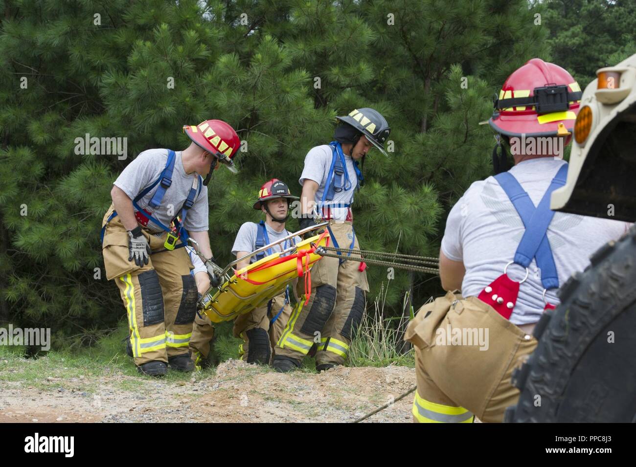 U.S. Air Force firefighters with the 446th Civil Engineer Squadron from ...