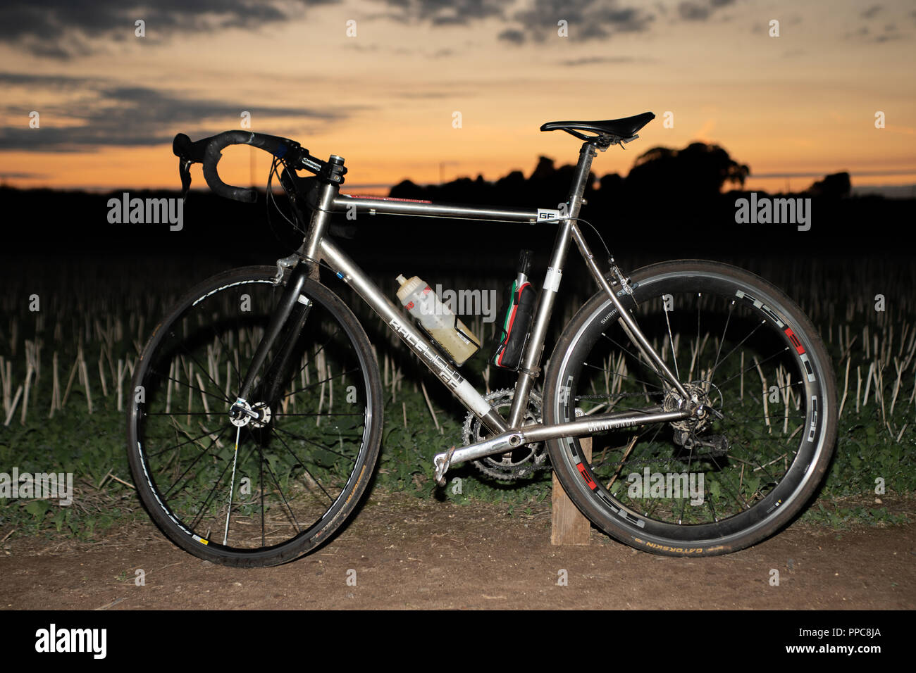 Bike at sunset hi-res stock photography and images - Alamy