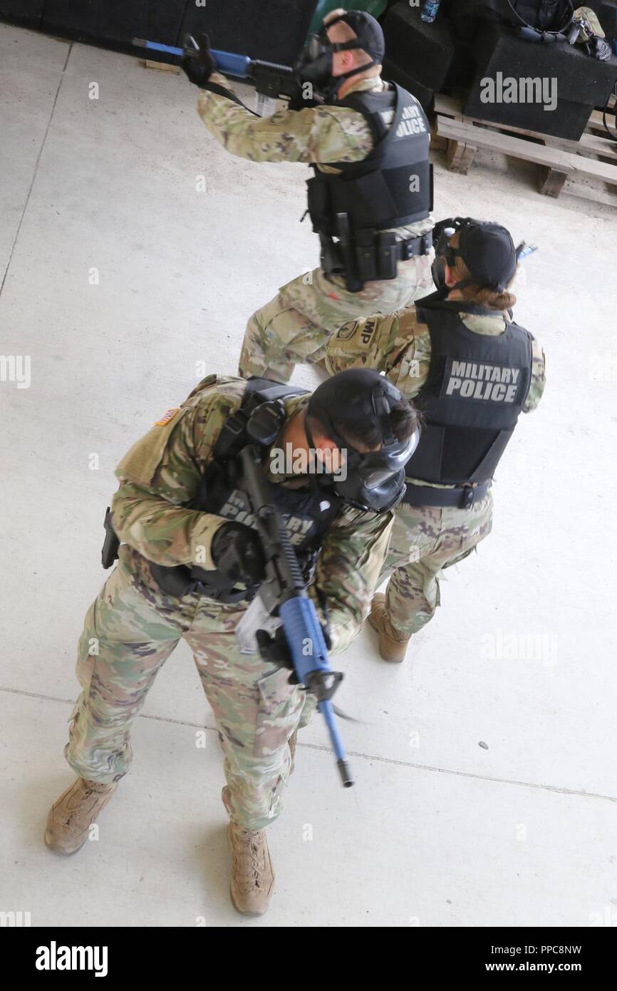 Military police officers with 293rd Military Police Company, 385th ...