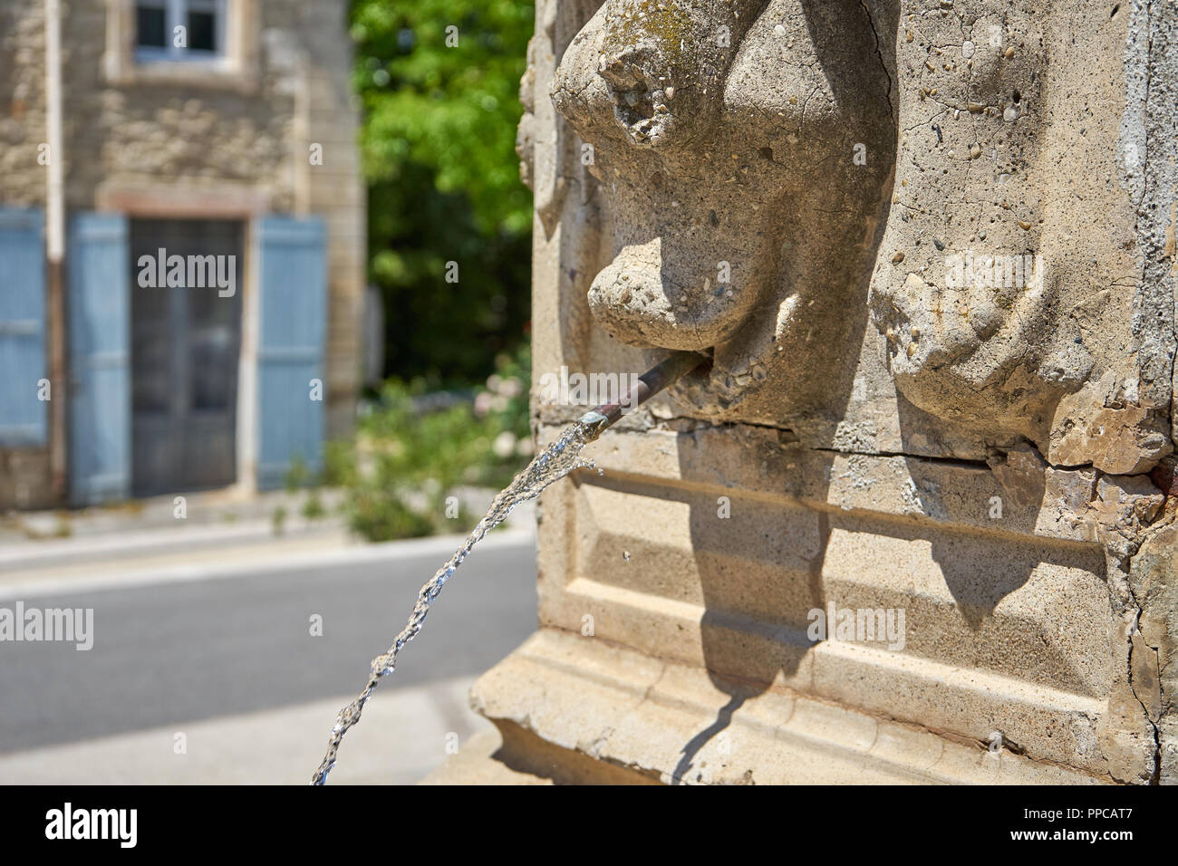 Stream Of Water Coming Out Of A Roman Art Fountain Stock Photo - Alamy