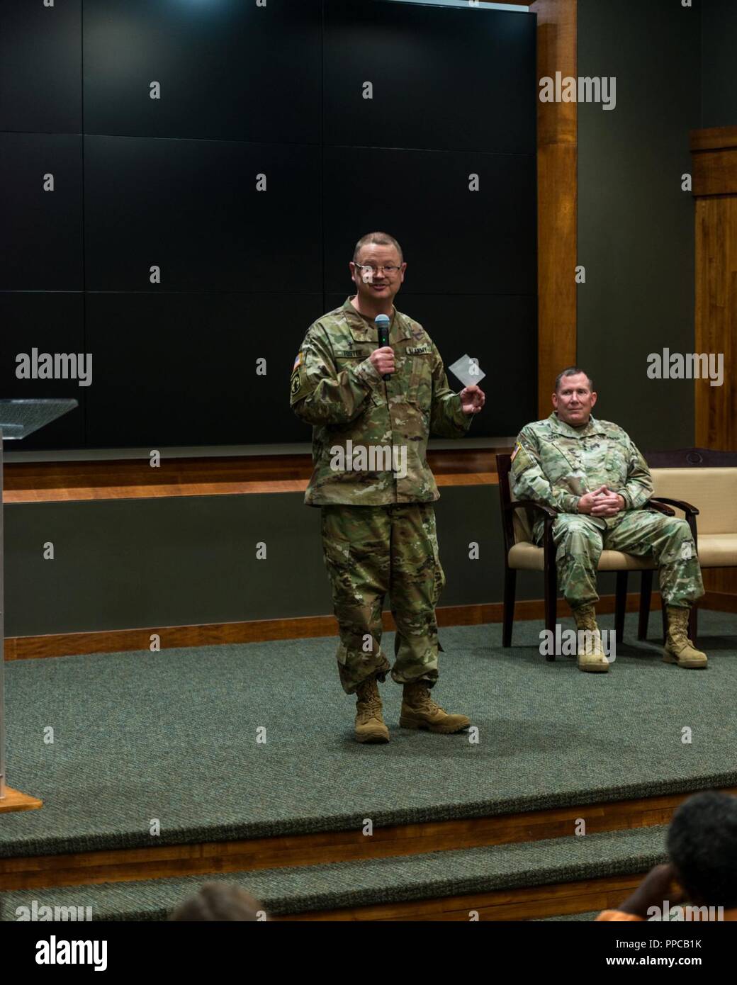 Chaplain (Col.) Steve Foster speaks during his promotion ceremony at ...