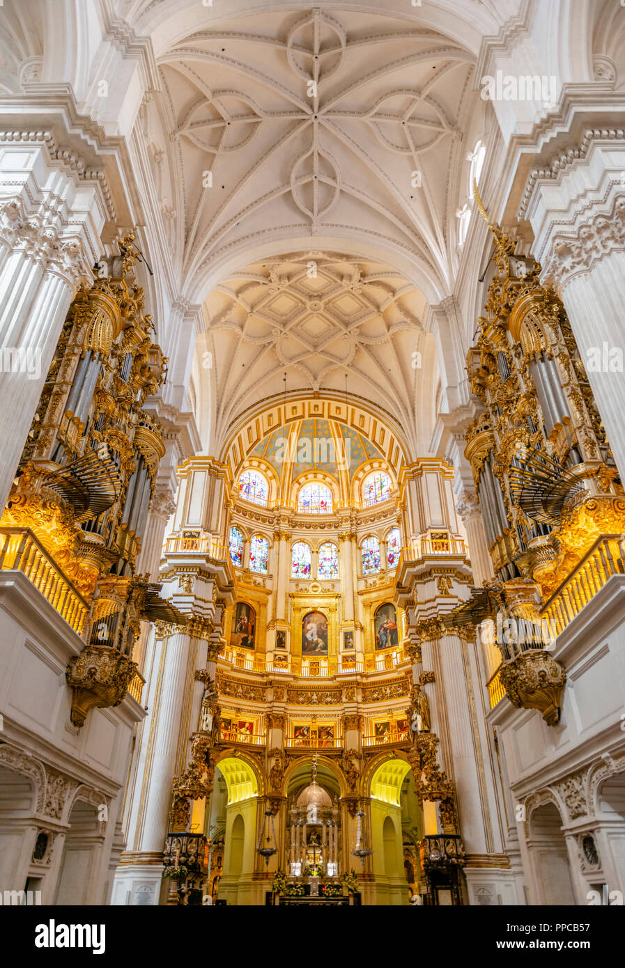 Cathedral, white interior and golden sanctuary, with stuccoed ceiling ...