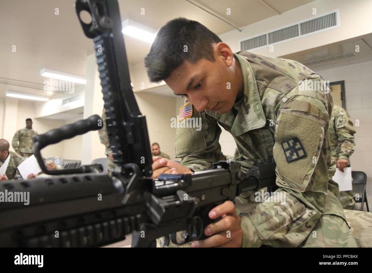 U.S. Army Reserve Pfc. Brian Gonzales, 668th Engineer Company, based in ...