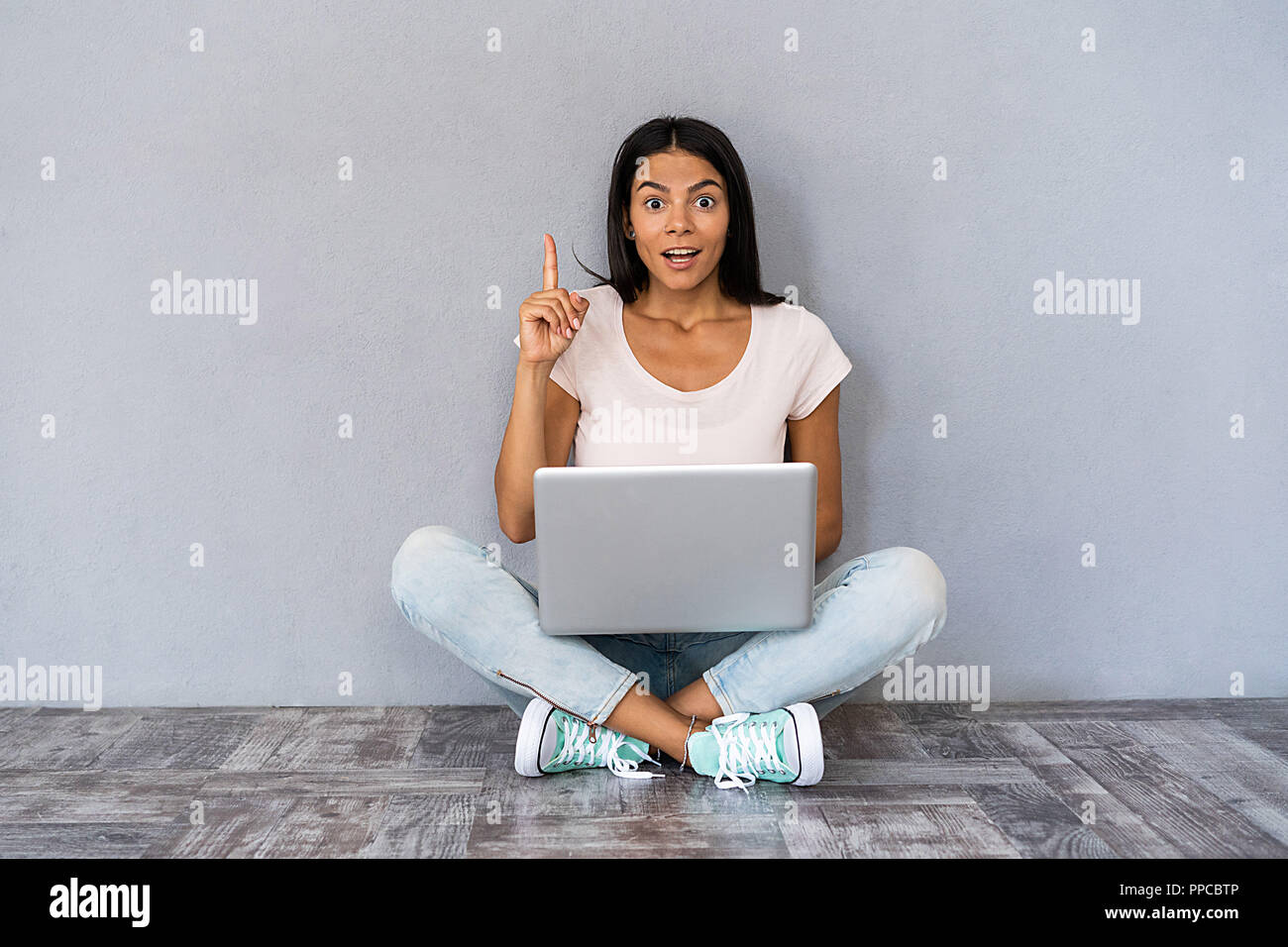 Woman sitting folded legs on hi-res stock photography and images - Alamy