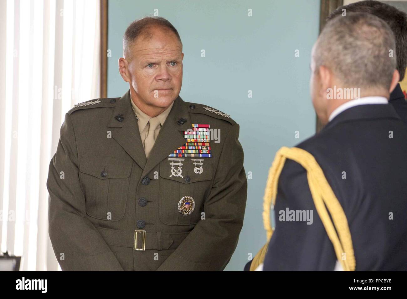 Commandant of the Marine Corps Gen. Robert B. Neller speaks with ...