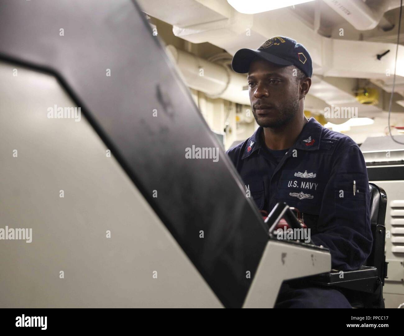 ATLANTIC OCEAN (Aug. 23, 2018) Engineman 1st Class Brian Adlam monitors ...