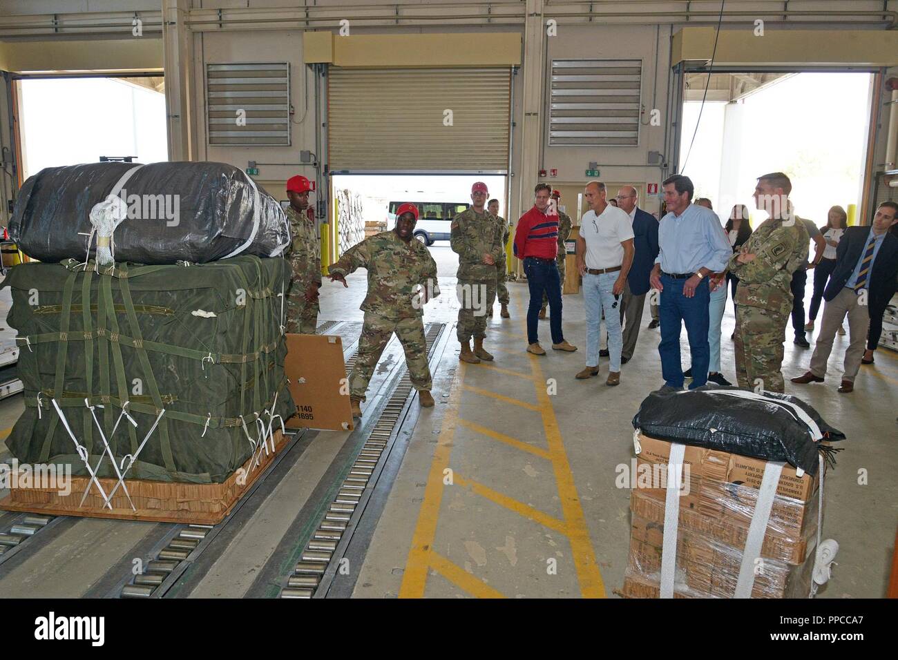 Members of the House Armed Services visit the Heavy Drop Rigging ...