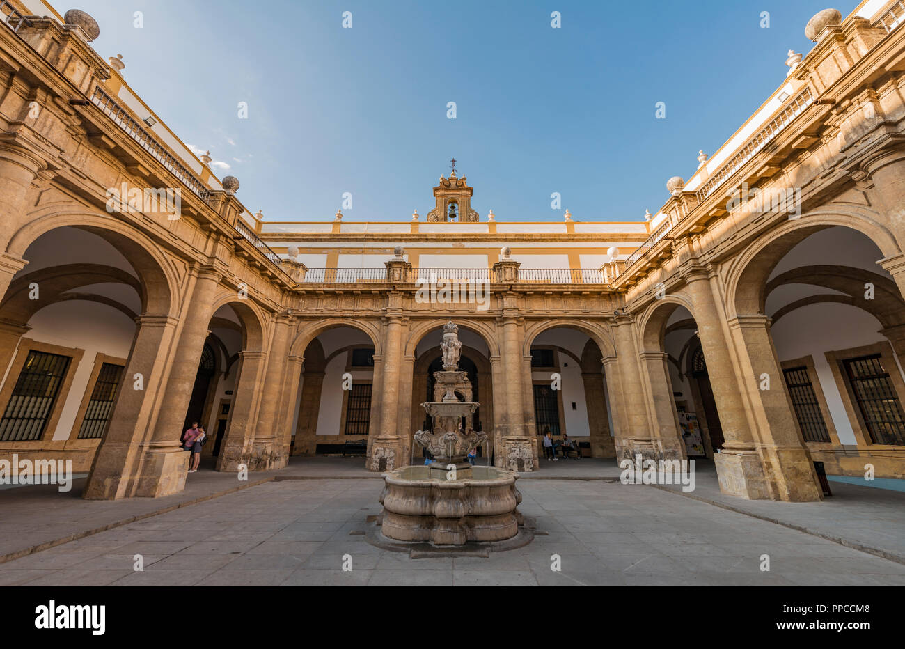 Neo-classical courtyard with fountain and pillar passage, University ...