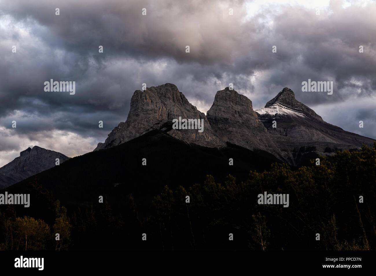 Breathtaking view of the famous Canadian Rockies Three Sisters Mountain ...