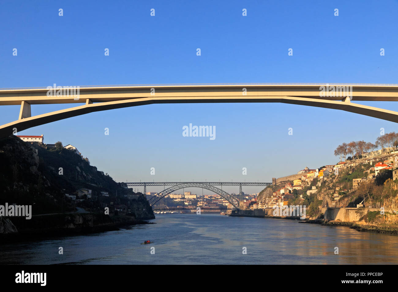 Interesting view of two of he several bridges over Douro river in Porto ...