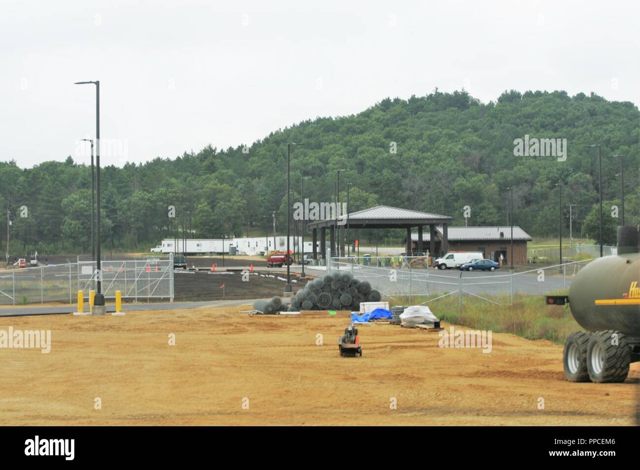 Workers with Catamount Constructors, Inc. of Lakewood, Colo., continue ...