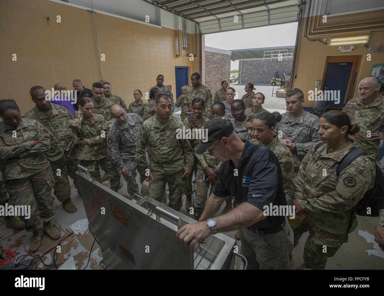 Bill Hague, center, from Babington Technology, instructs New Jersey ...